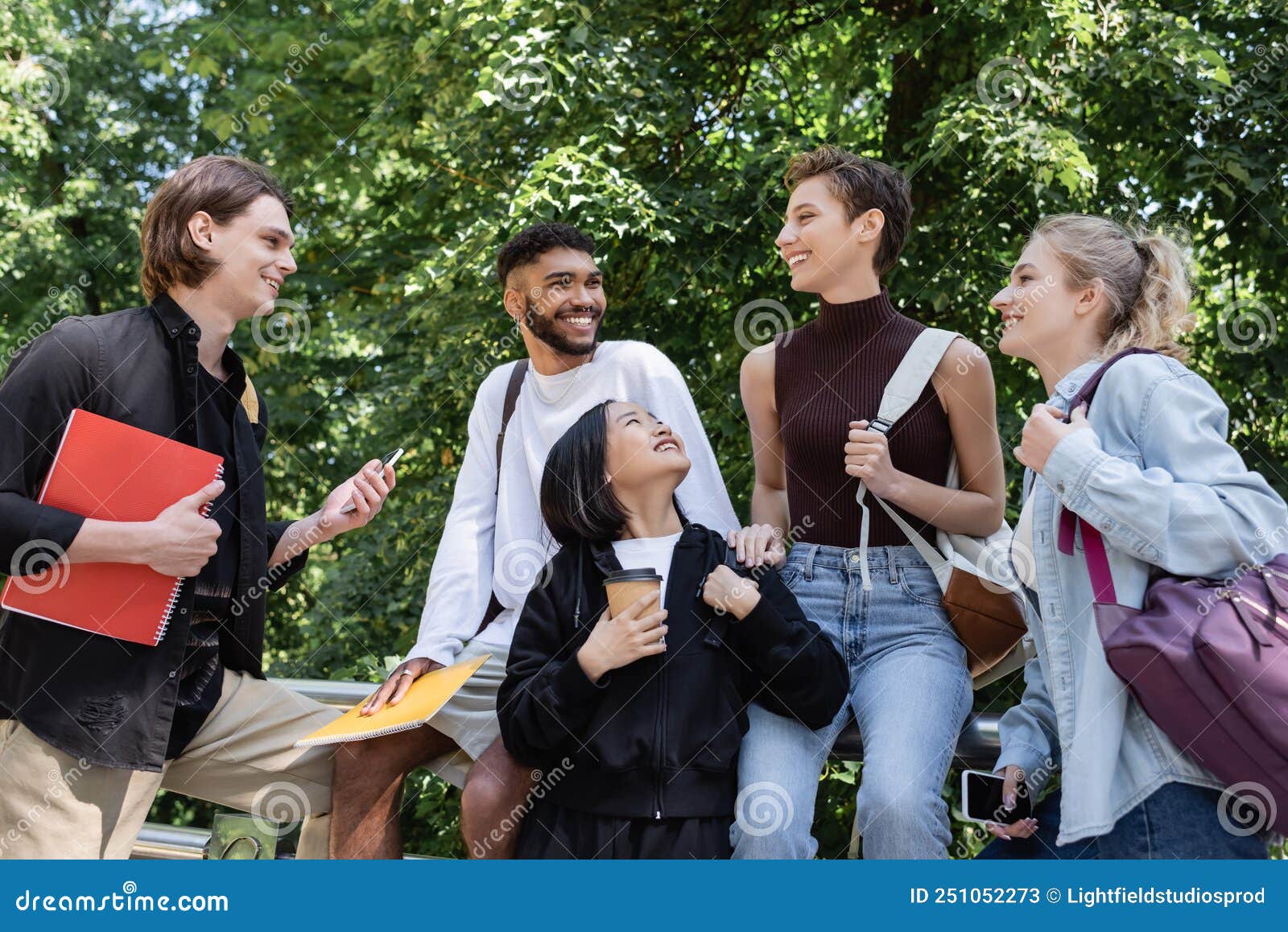Smiling Multicultural Students with Notebooks and Stock Image - Image ...