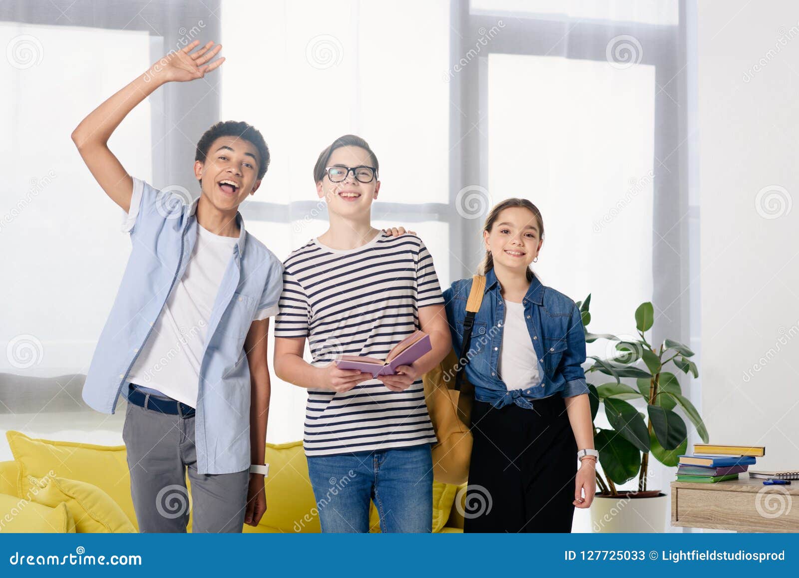 Smiling Multicultural Teenagers Greeting Someone Stock Image - Image of ... Smiling Multicultural Teenagers Greeting Someone Stock Image - Image of ...