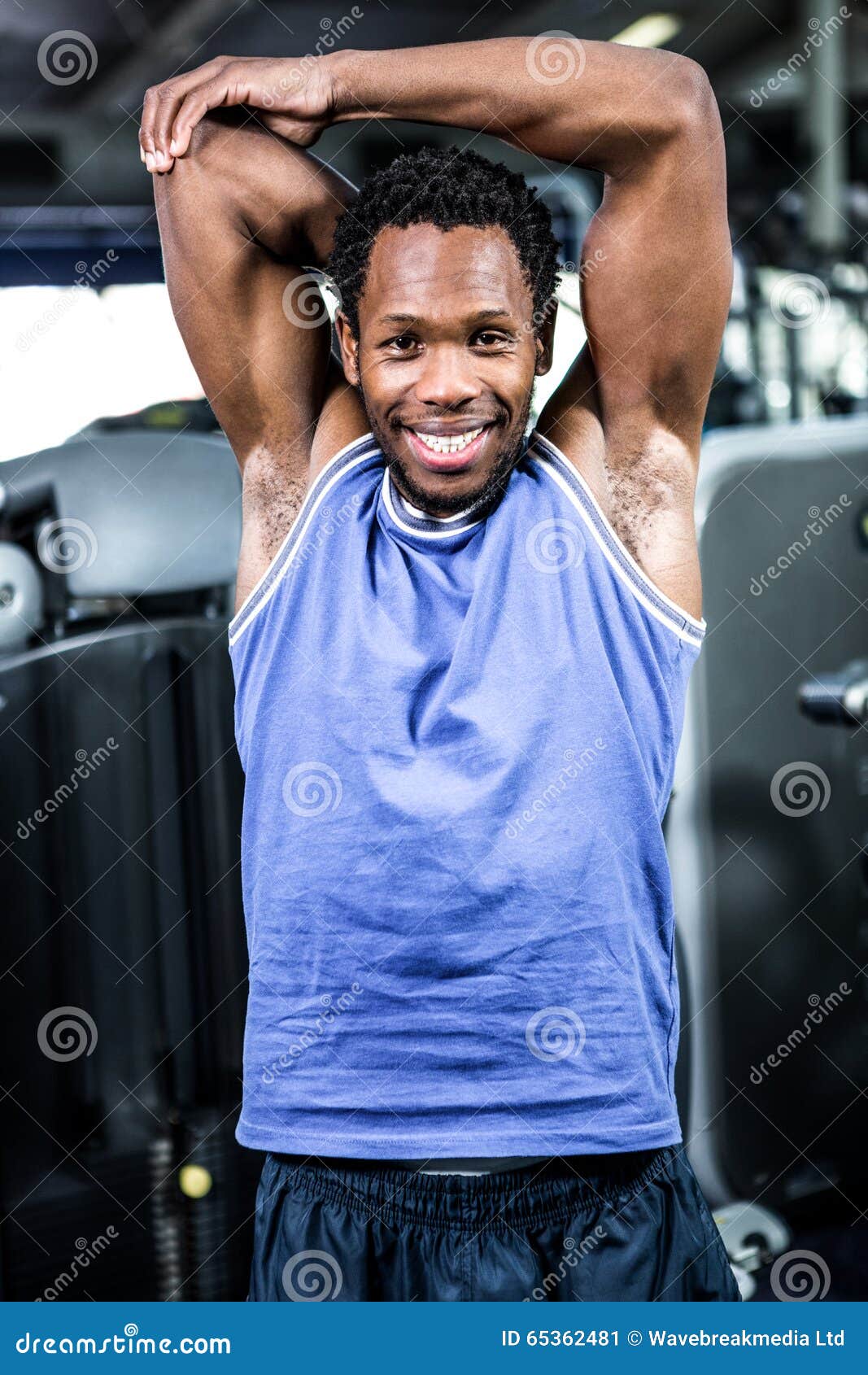 Smiling Muscular Man Stretching Arms Stock Image - Image of lifestyle ...