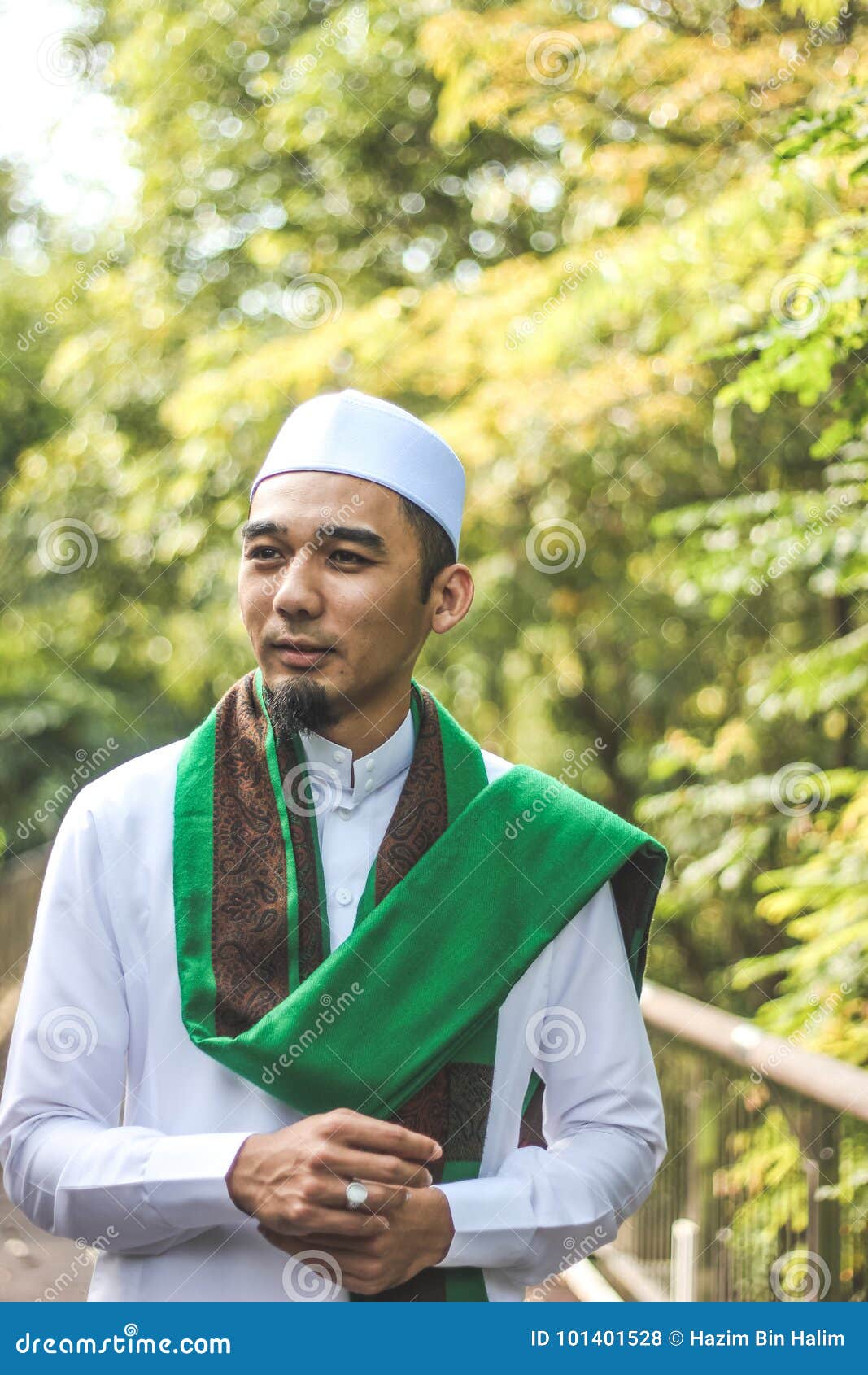 Smiling Muslim Man stock photo. Image of adult, green - 101401528