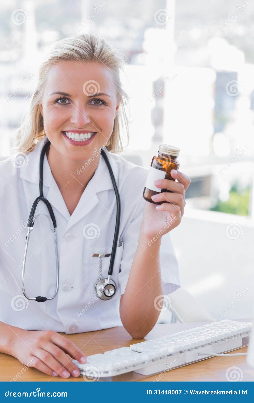 Smiling Nurse Holding a Medicine Jar Stock Image - Image of attractive ...