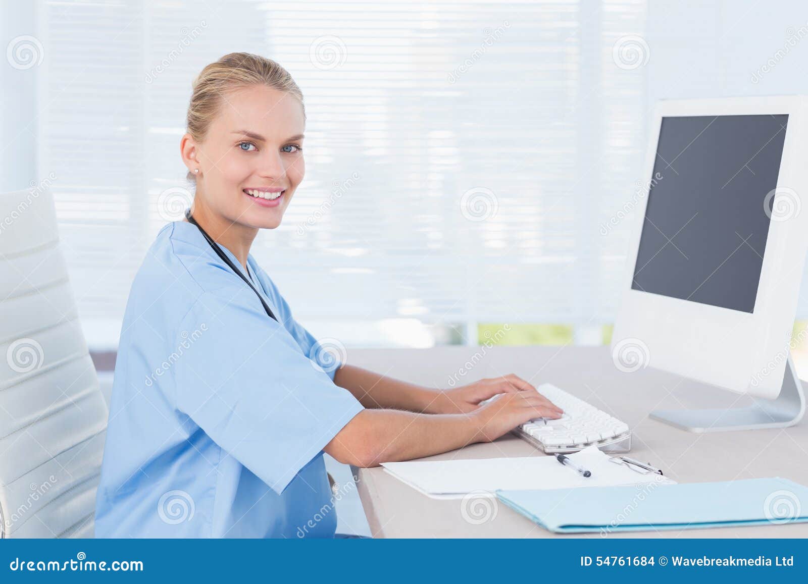 Smiling Nurse Looking at Camera Stock Photo - Image of female ...