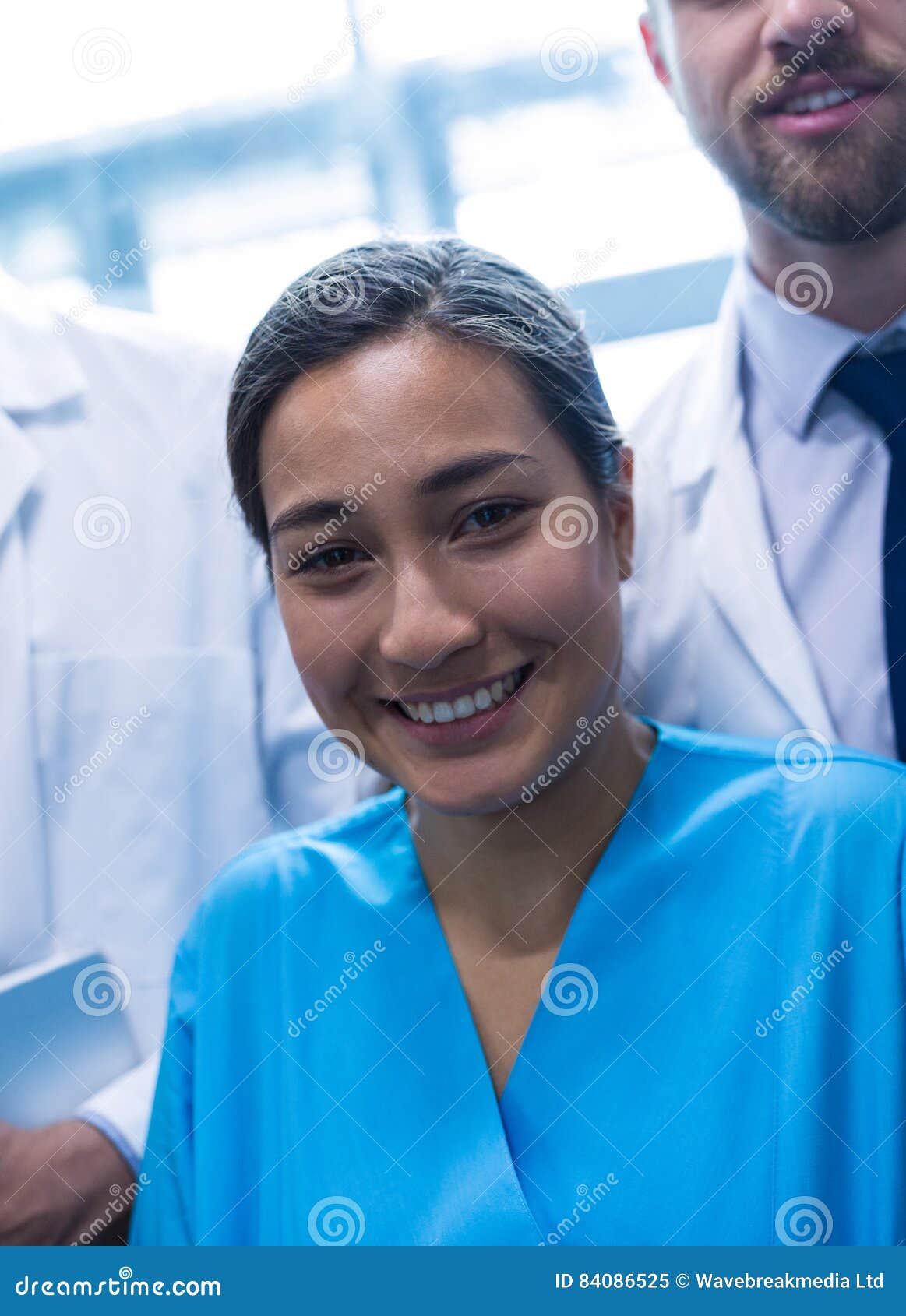 Smiling Nurse Standing in Hospital Stock Image - Image of caucasian ...