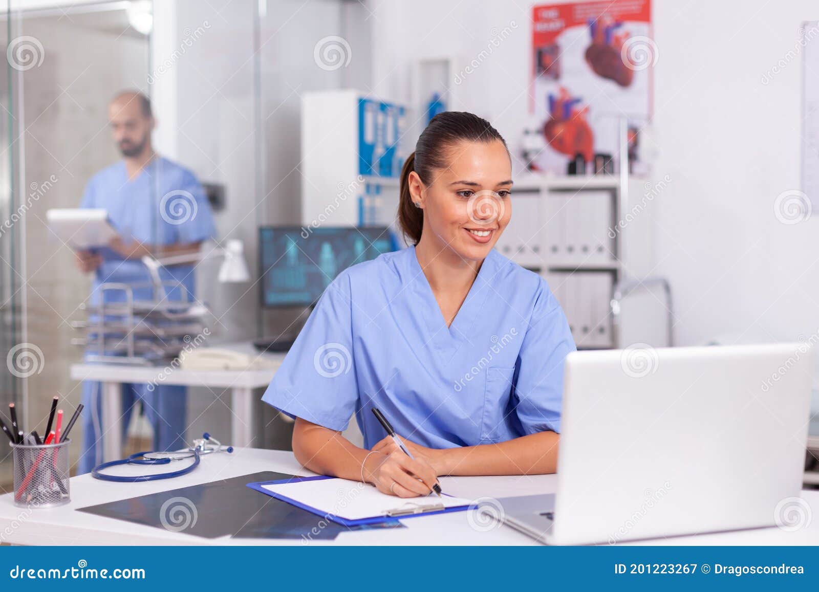 Smiling Nurse Using Laptop Computer Stock Image - Image of portrait ...