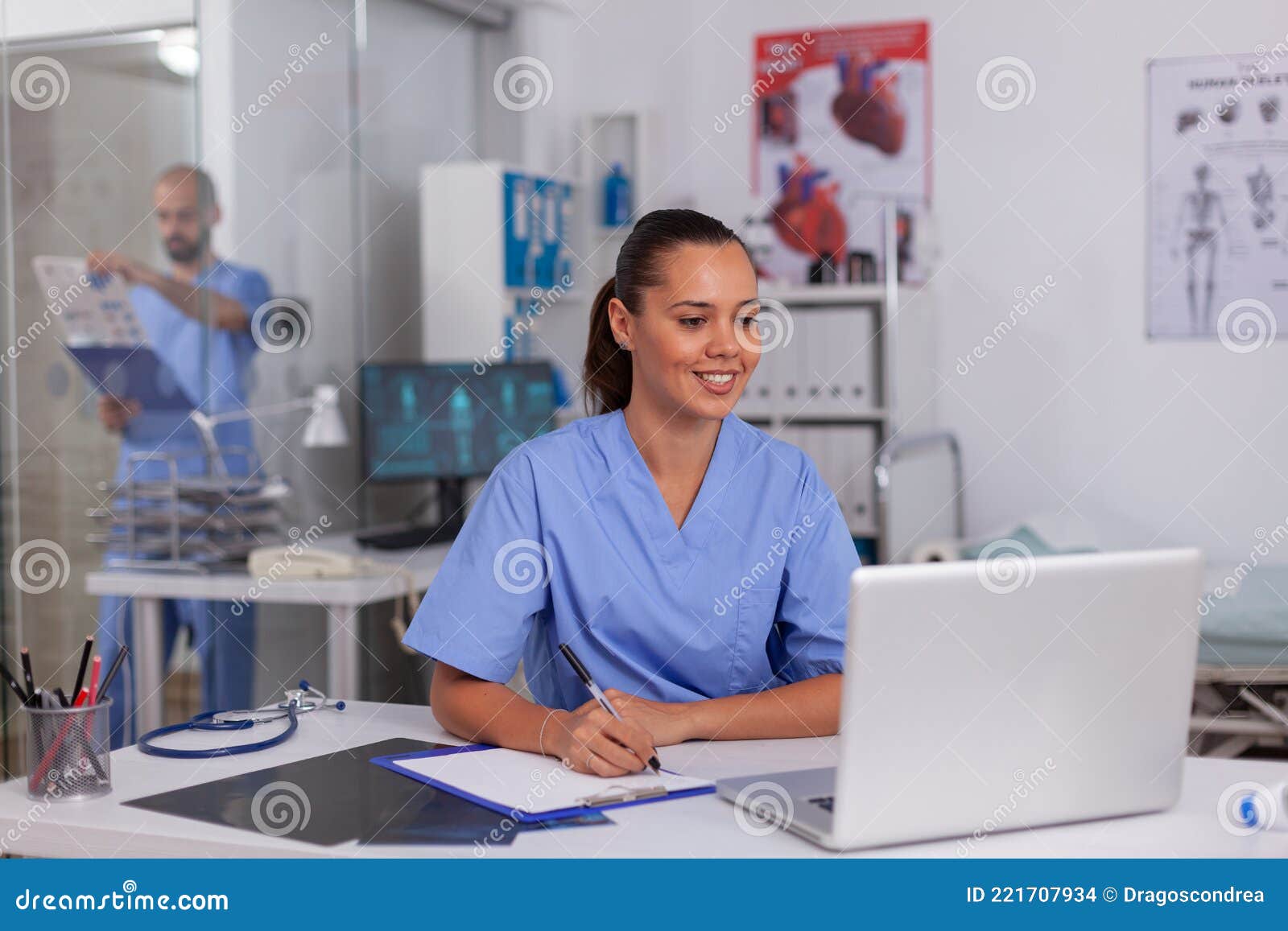 Smiling Nurse Using Laptop Computer Stock Photo - Image of worker ...