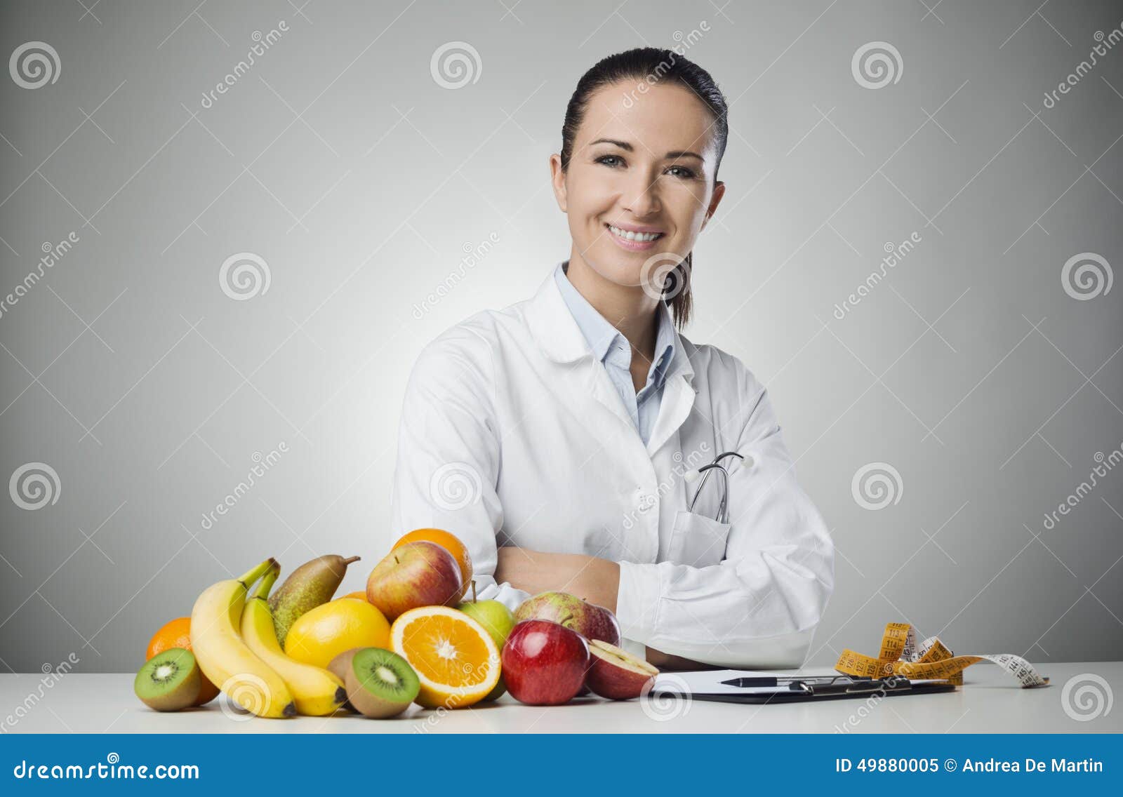 Smiling Nutritionist at Work Stock Image - Image of coat, desk: 49880005