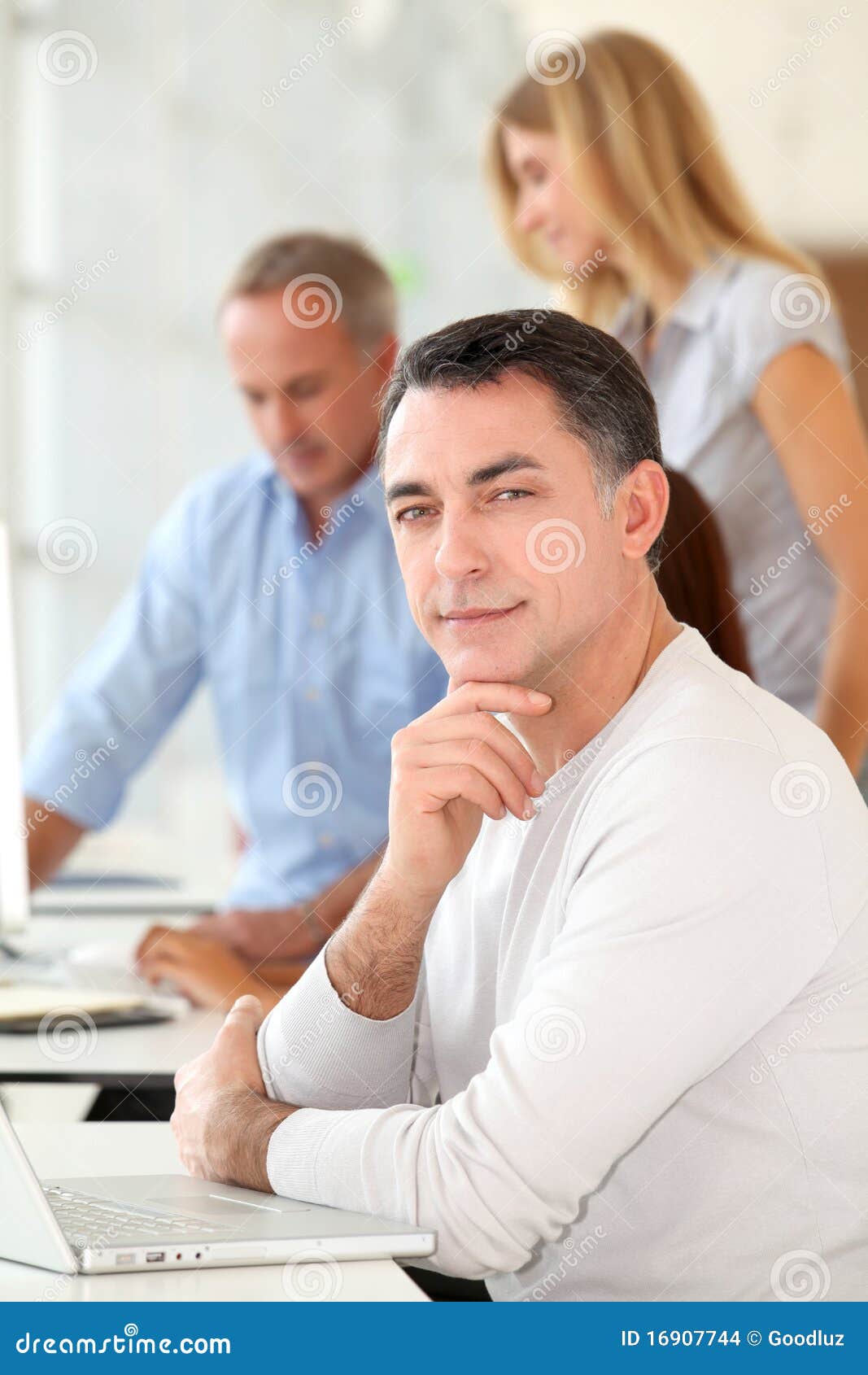 Smiling office worker stock photo. Image of corporate - 16907744