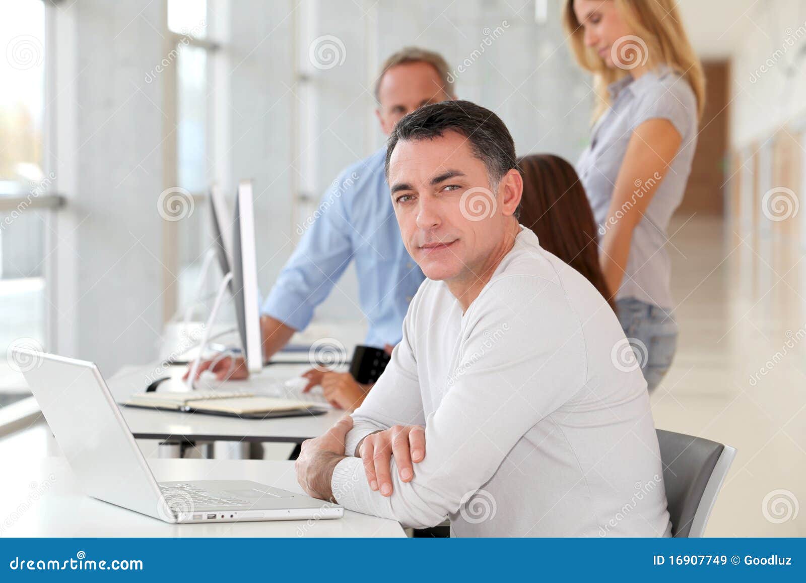 Smiling office worker stock image. Image of director - 16907749