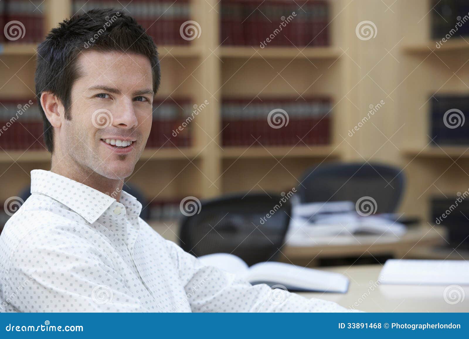 Smiling Office Worker in Office Stock Photo - Image of professional ...
