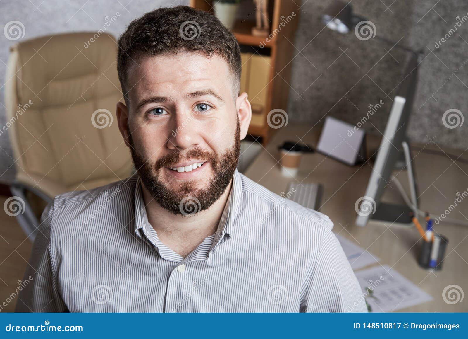 Smiling Office Worker at Office Stock Image - Image of looking, beard ...