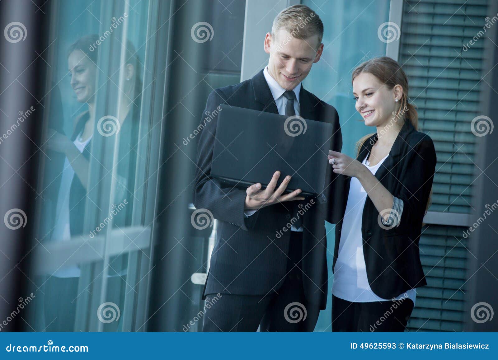 Smiling Office Workers Using Laptop Stock Image - Image of male, office ...
