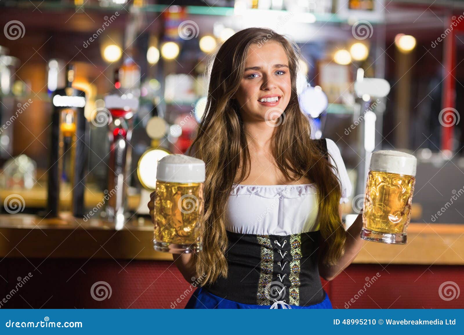 Smiling Oktoberfest Barmaid with Beer Stock Photo - Image of looking ...