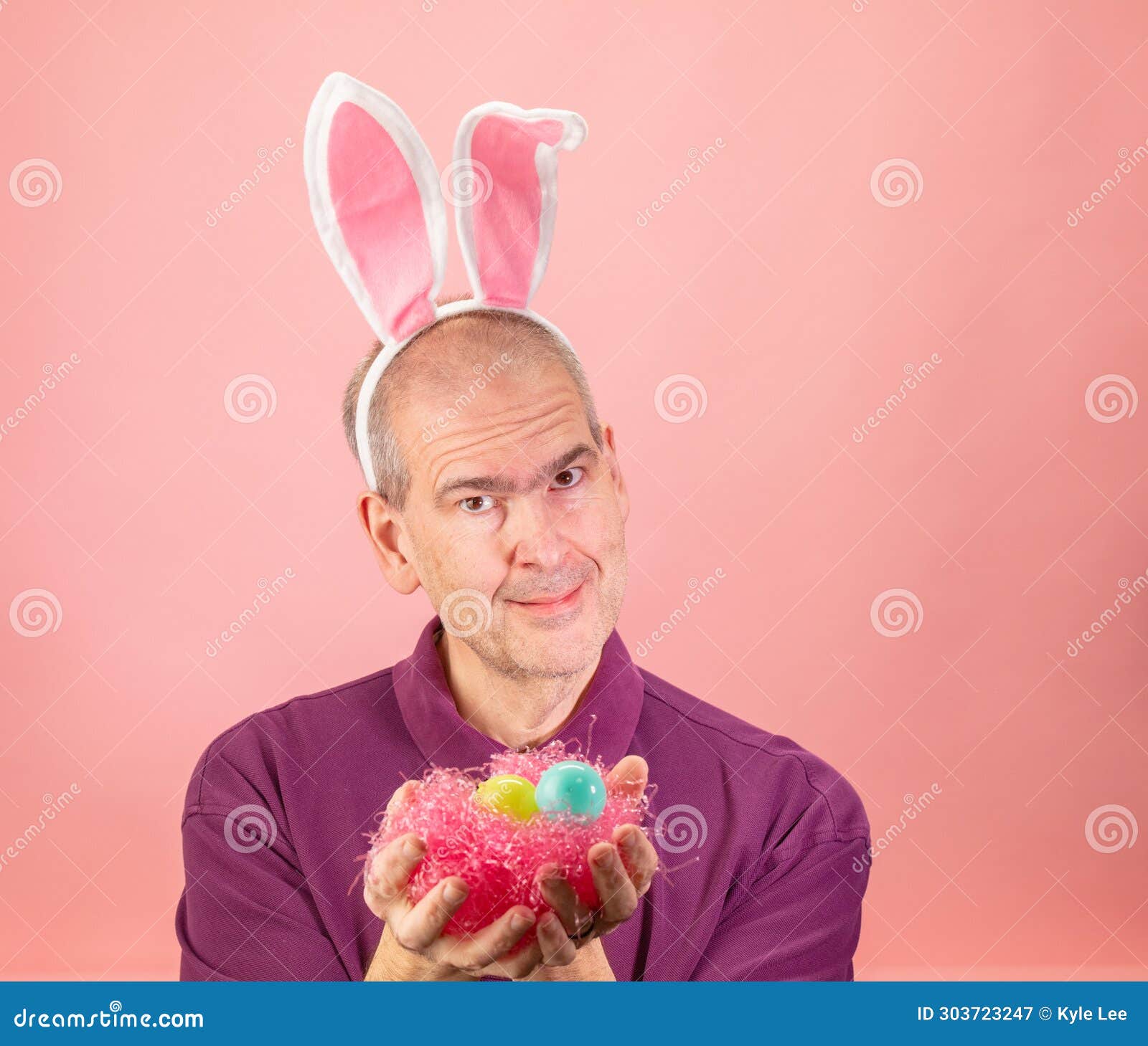 Smiling Old Man with Easter Bunny Ears and Plastic Eggs Stock Image ...