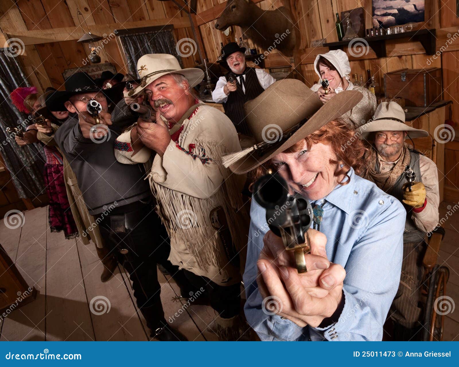 Smiling Older Woman Points Gun Stock Image - Image of playing, crowd ...