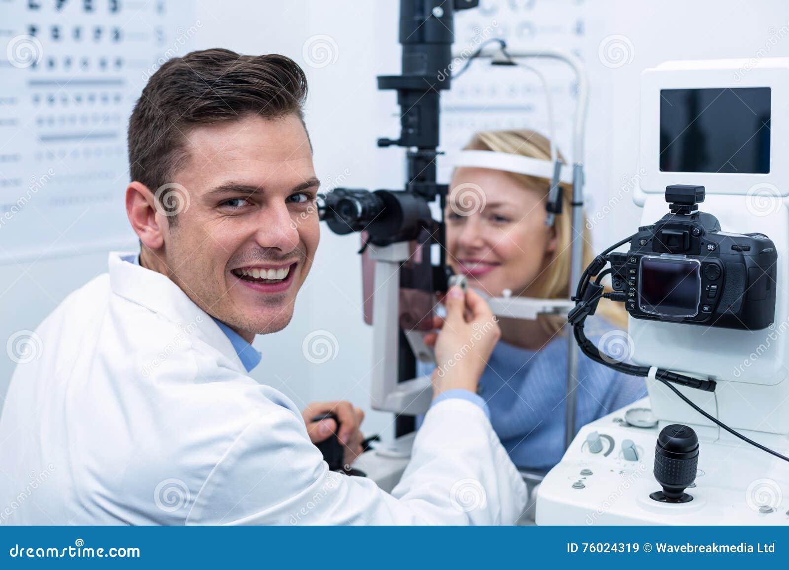 Smiling Optometrist Examining Female Patient on Slit Lamp Stock Image ... Smiling Optometrist Examining Female Patient on Slit Lamp Stock Image ...