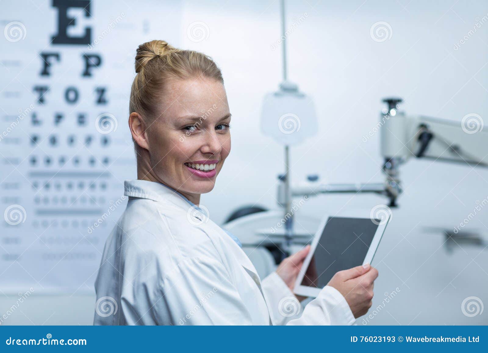 Smiling Optometrist Using Digital Tablet Stock Image - Image of ...