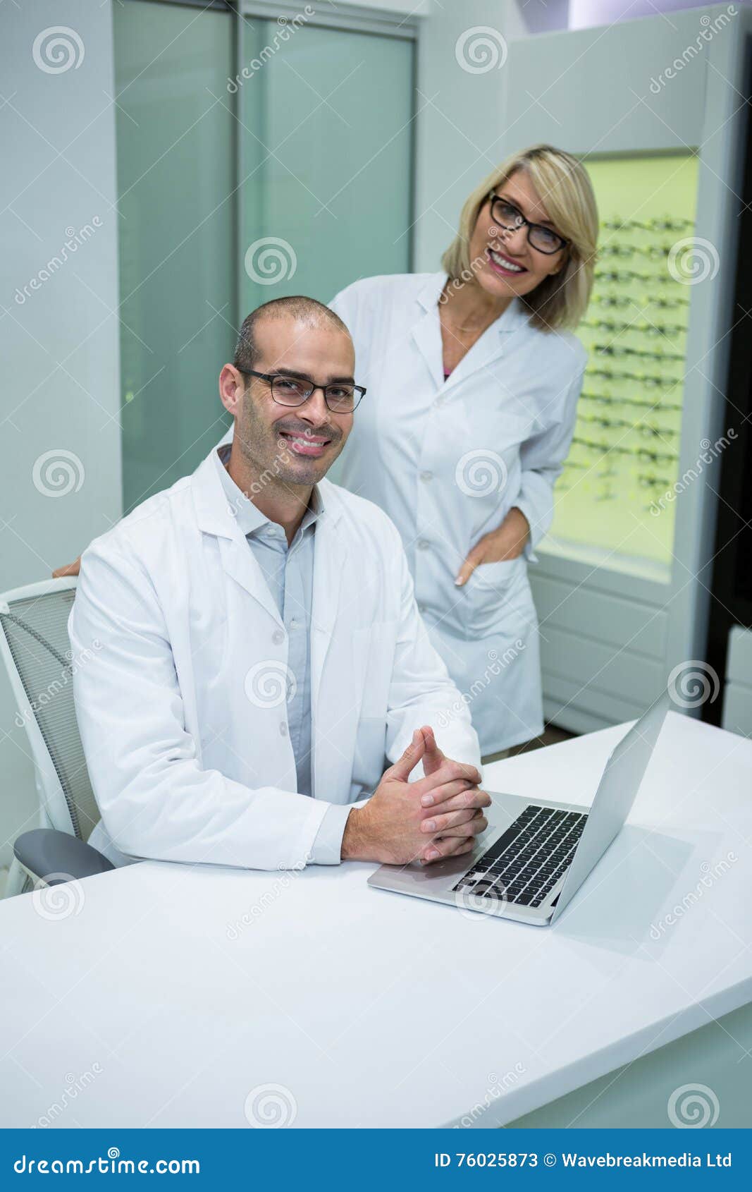 Smiling Optometrists in Ophthalmology Clinic Stock Image - Image of ...