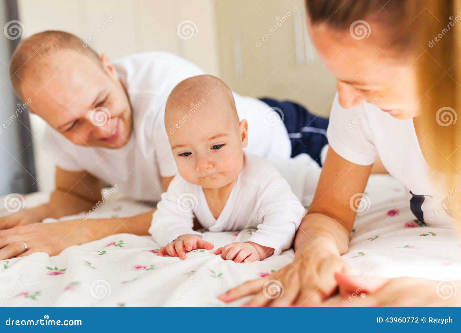 Smiling Parents with Cute Baby Stock Photo - Image of rest, mother ...