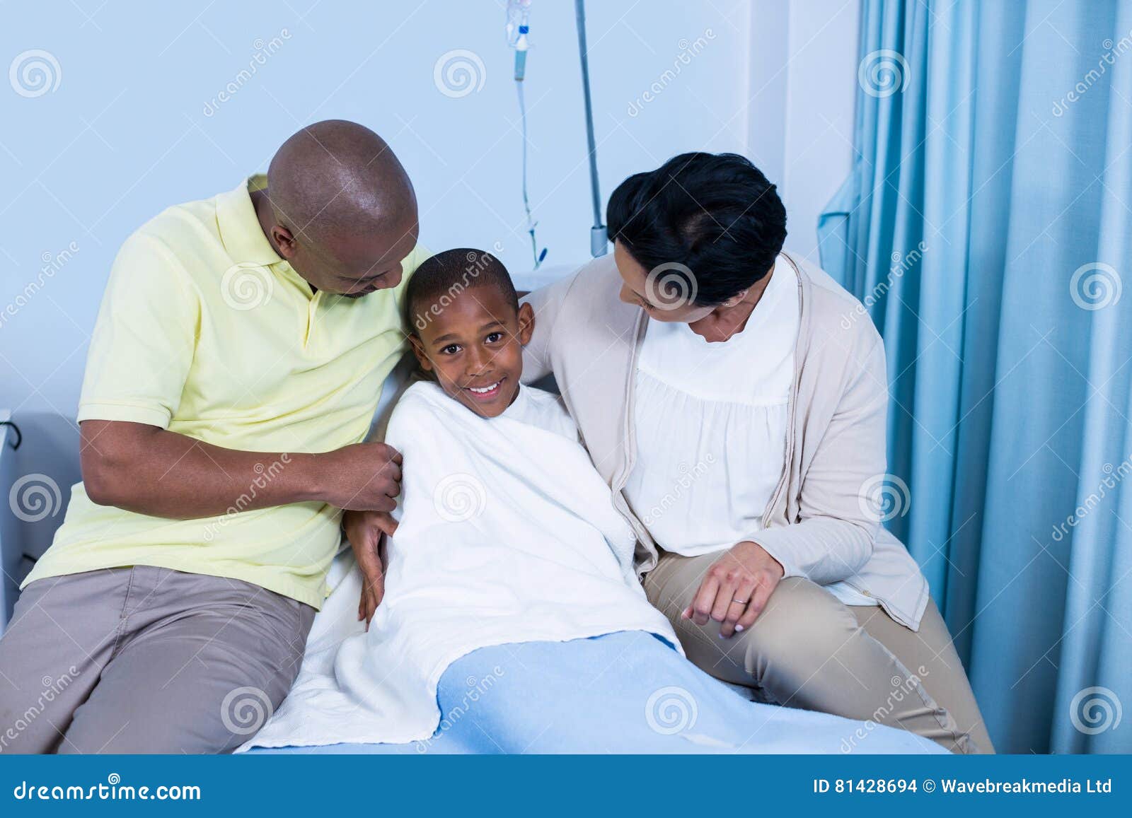 Smiling Parents Interacting with Patient Stock Photo - Image of adult ...