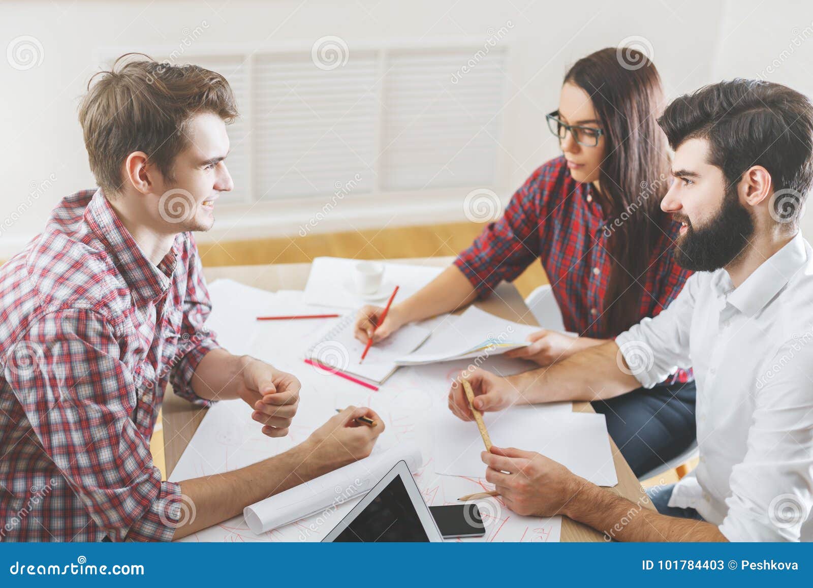 Smiling People Doing Paperwork and Using Devices Stock Image - Image of ...