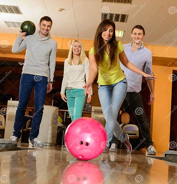 Smiling People Playing Bowling Stock Photo - Image of competition ...