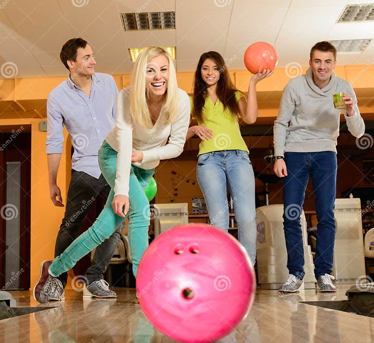 Smiling People Playing Bowling Stock Photo - Image of people, bowling ...