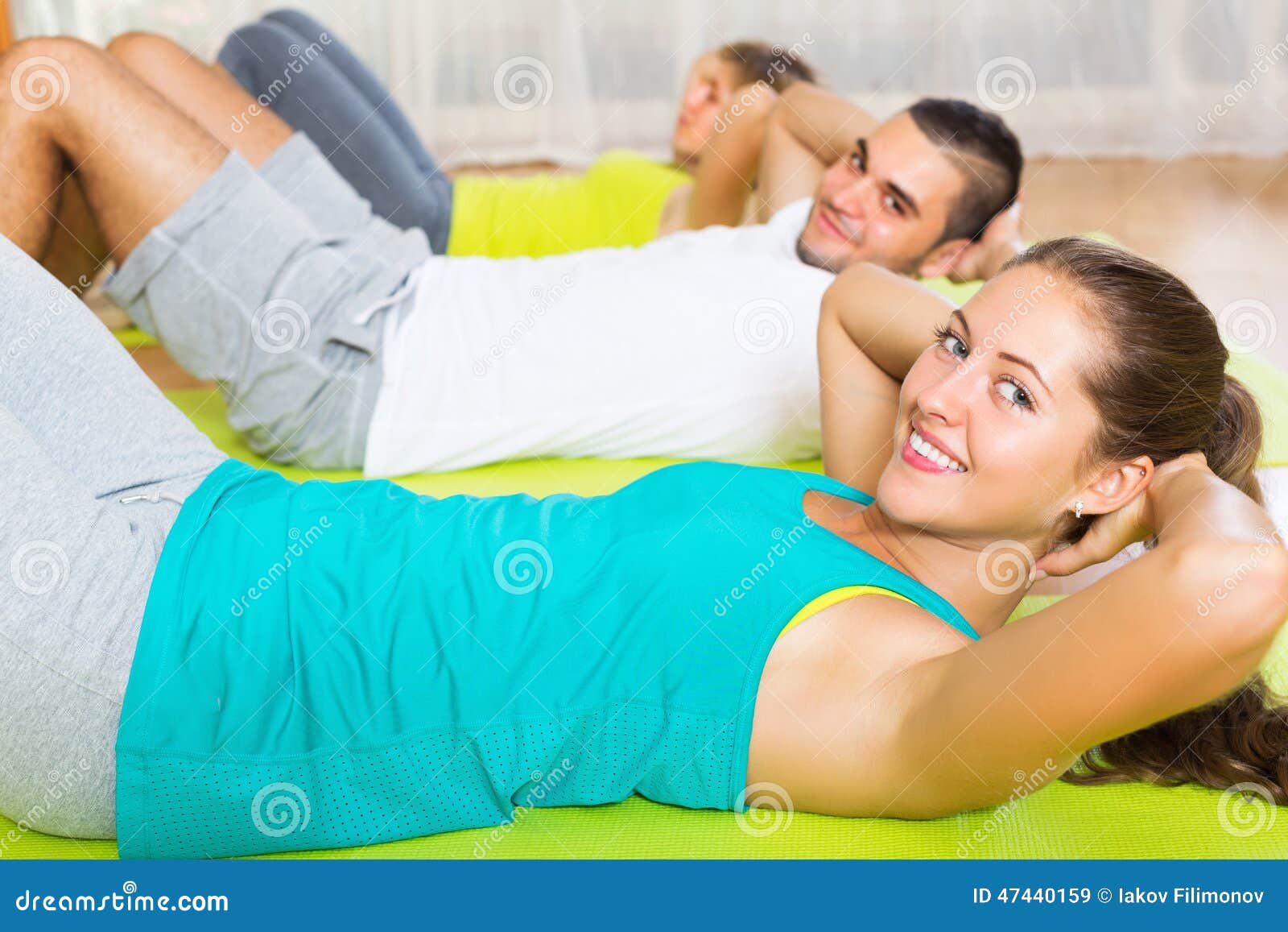 Smiling People Working in Gym Stock Image - Image of exercising, active ...