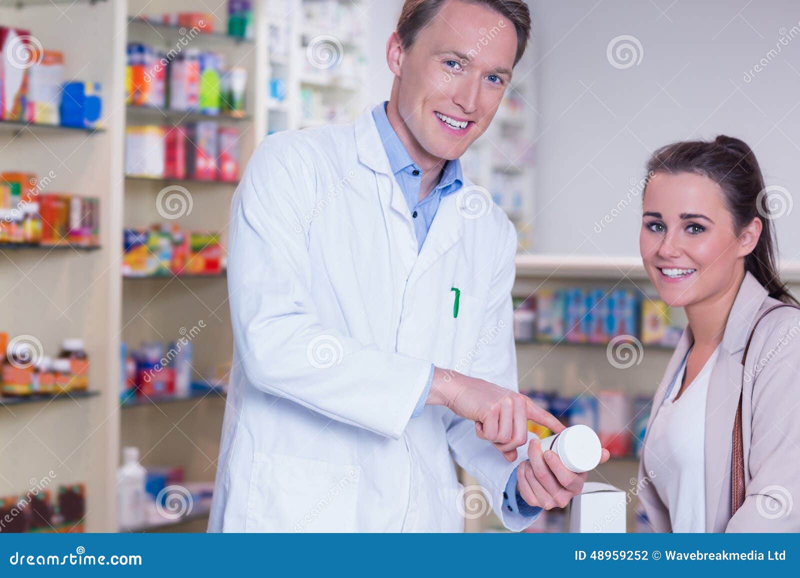 Smiling Pharmacist Explaining the Pills To Patient Stock Photo - Image ...