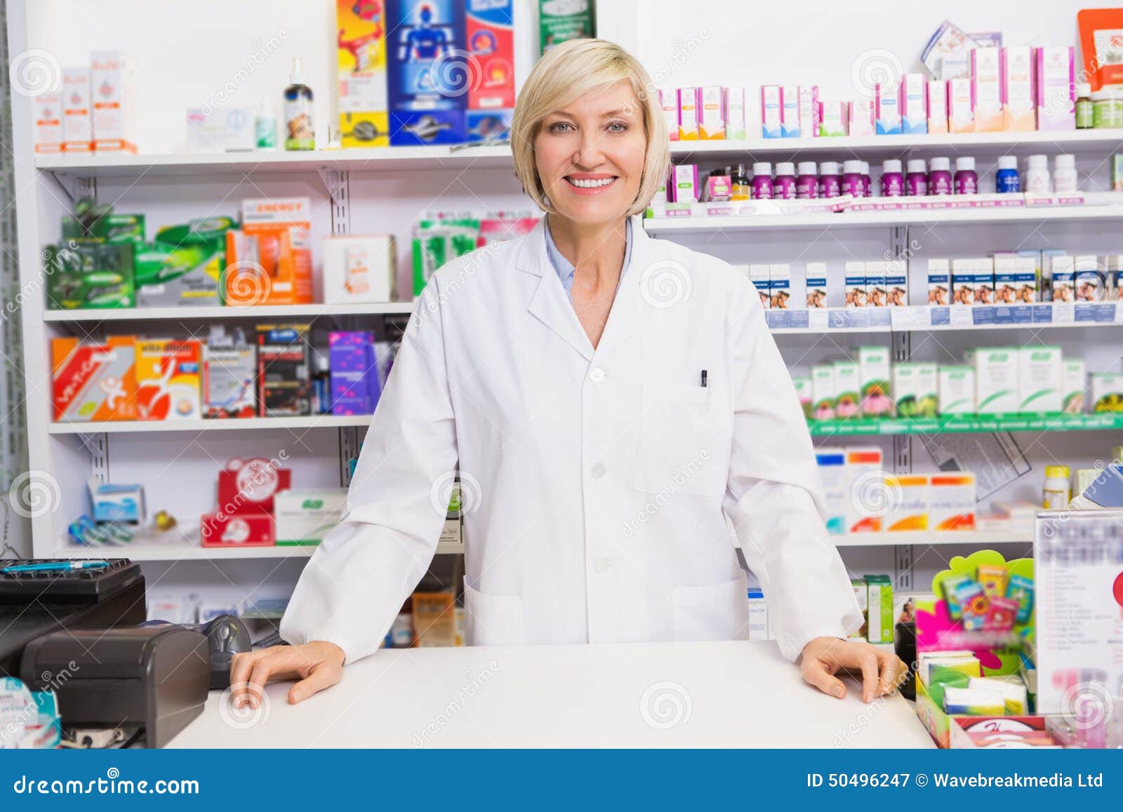 Smiling Pharmacist Posing Behind the Counter Stock Image - Image of ...