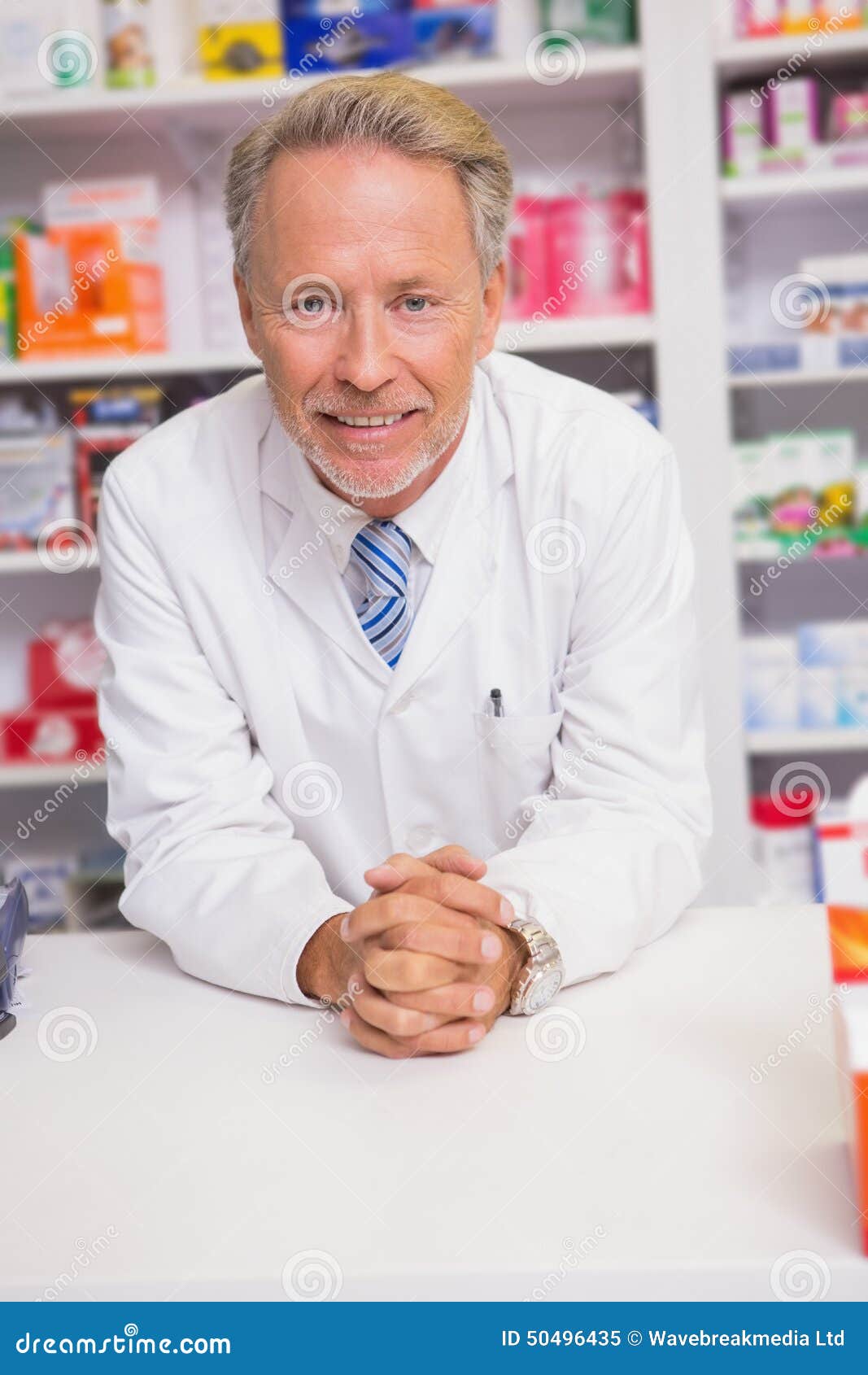 Smiling Pharmacist Posing on Desk Stock Image - Image of treatment ...