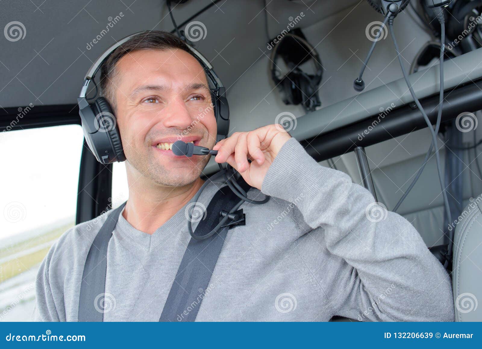Smiling pilot in aircraft stock image. Image of private - 132206639