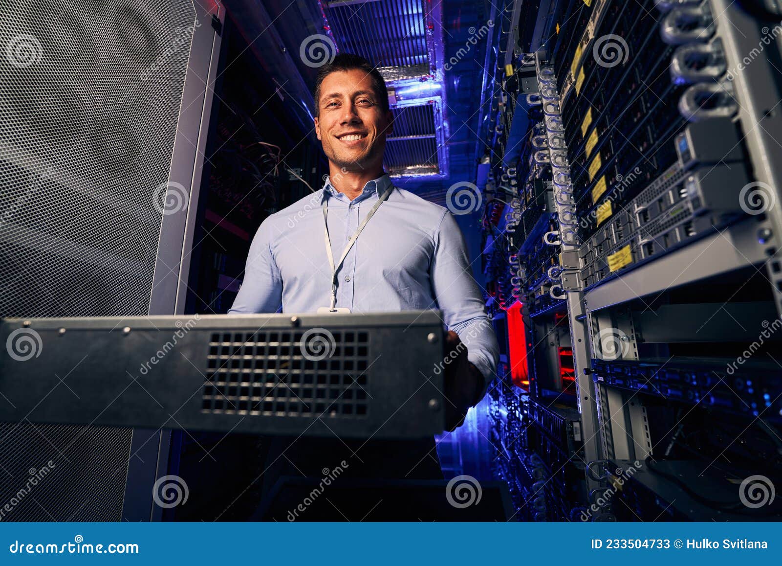 Smiling Pleased Engineer Demonstrating New Hardware Component Stock ...