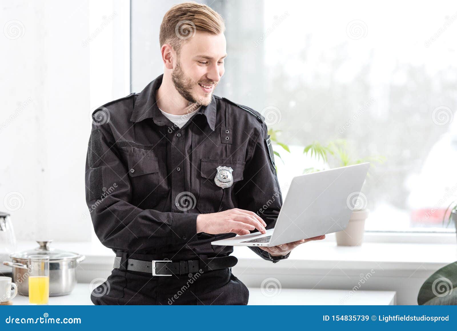 Smiling Police Officer Standing and Using Laptop Stock Image - Image of ...