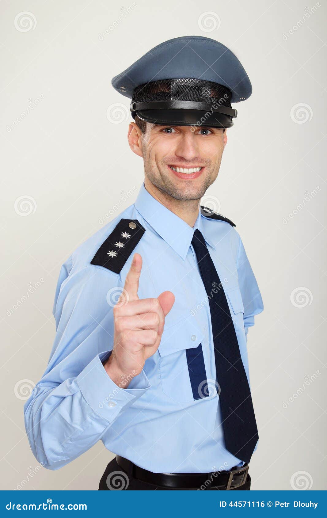Smiling policeman stock photo. Image of shirt, people - 44571116