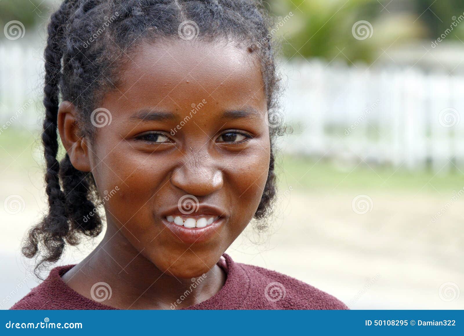 Smiling poor african girl stock image. Image of african - 50108295