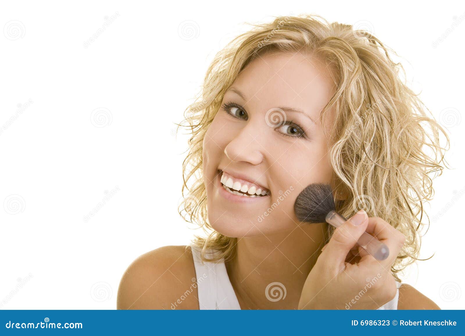 Smiling while powdering stock image. Image of glamour - 6986323