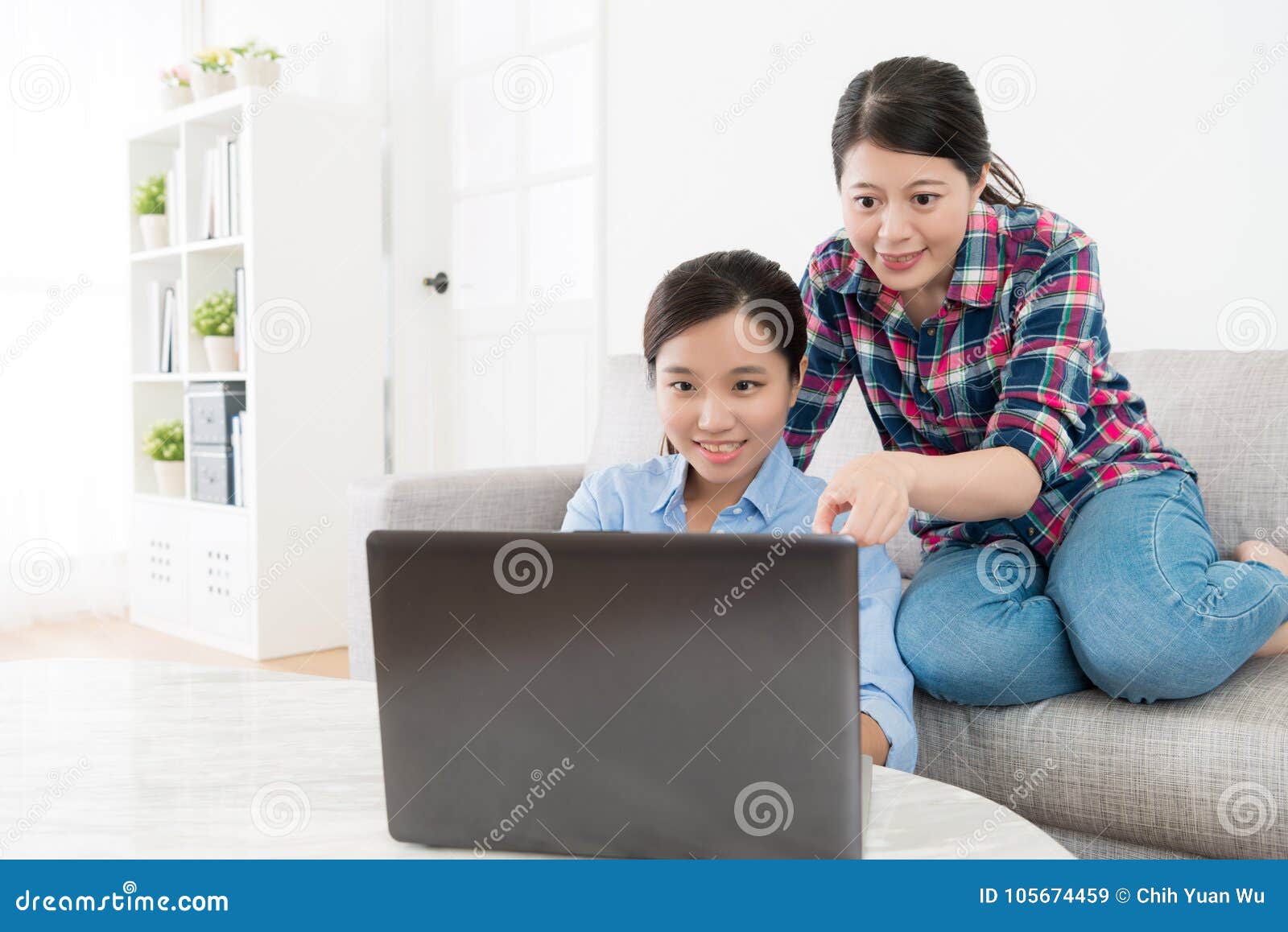 Smiling Pretty Female Friends Using Mobile Computer Stock Image - Image ...