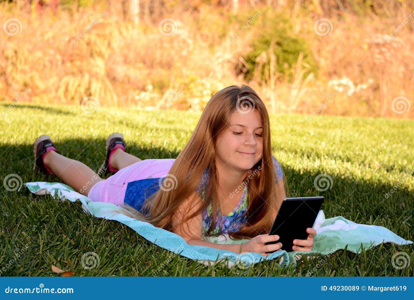 Smiling Pretty Girl Using Her Tablet. Stock Image - Image of friends ...