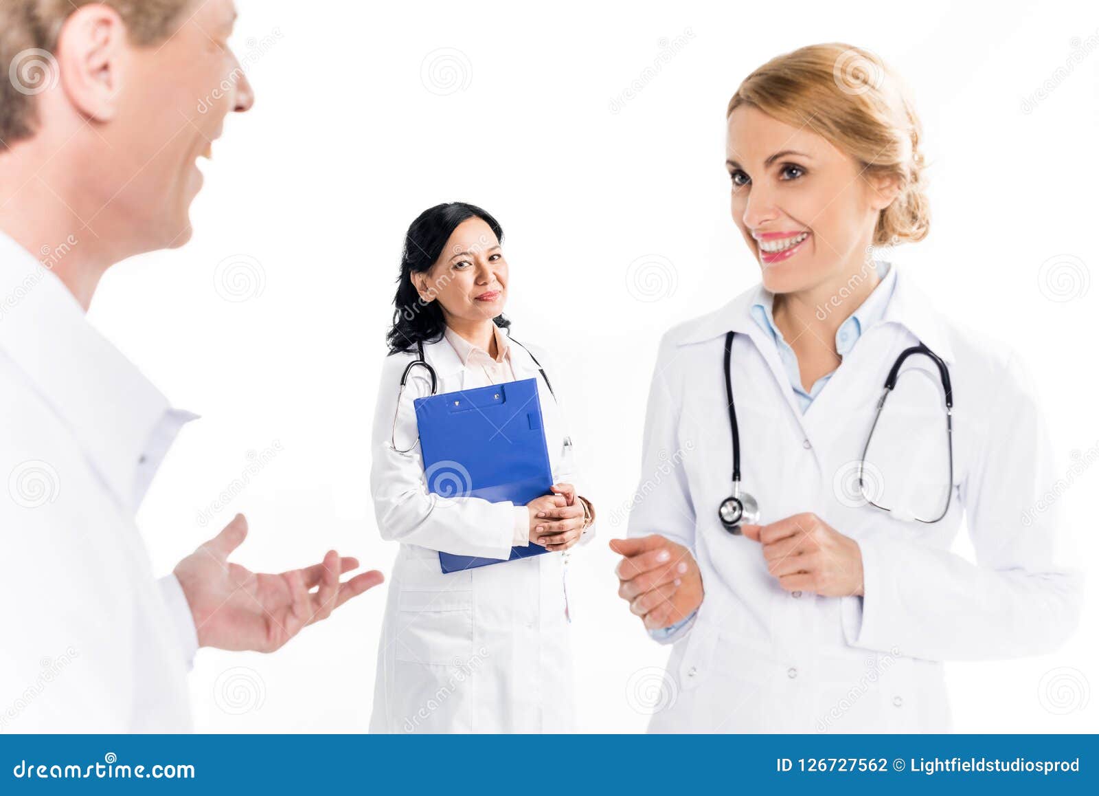 Smiling Professional Doctors Talking Isolated Stock Photo - Image of ...