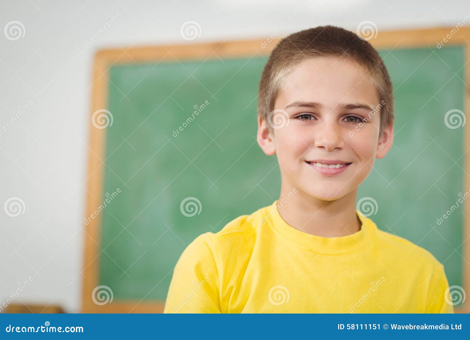 Smiling Pupil Sitting in a Classroom Stock Image - Image of elementary ...