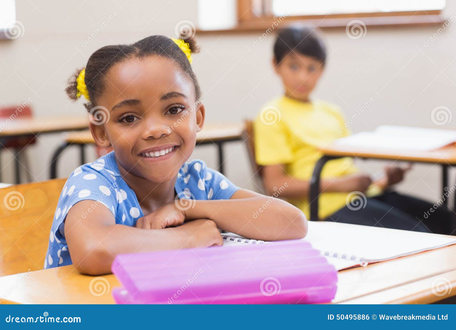 Smiling Pupil Sitting at Her Desk Stock Photo - Image of childhood ...