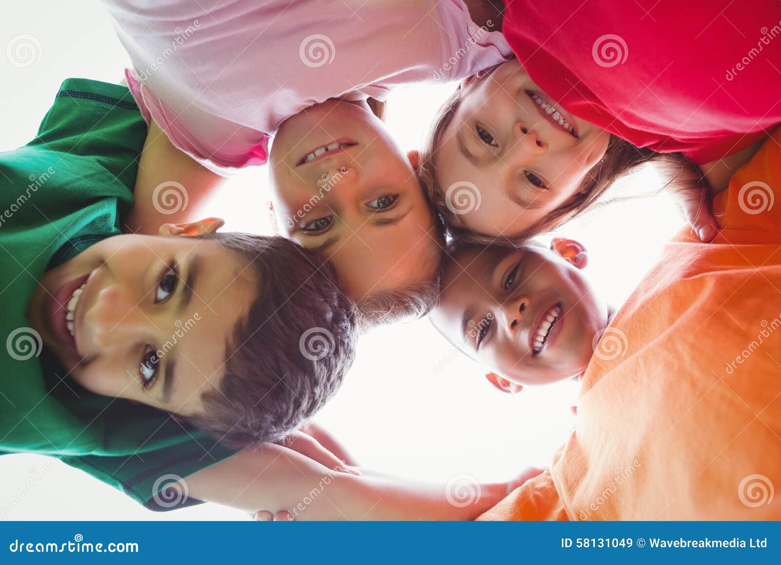 Smiling Pupils Looking Down at the Camera Stock Image - Image of ...