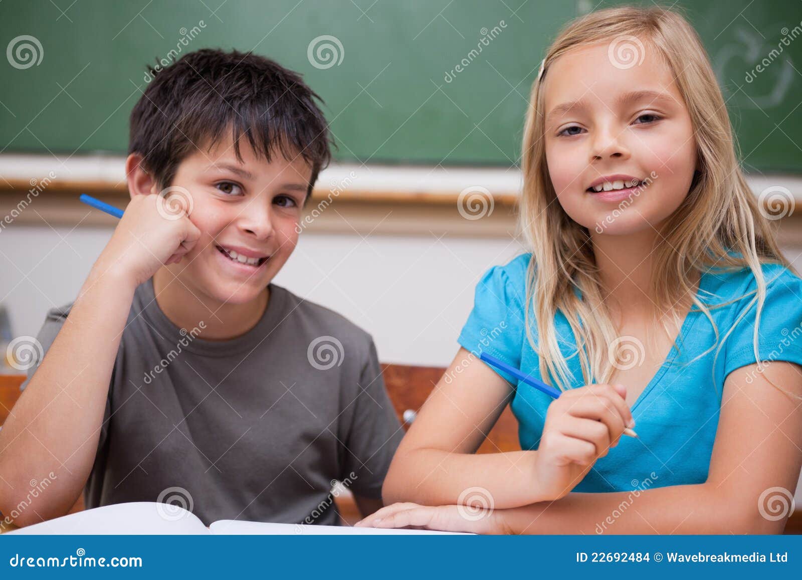 Smiling Pupils Working Together Stock Photo - Image of childhood ...