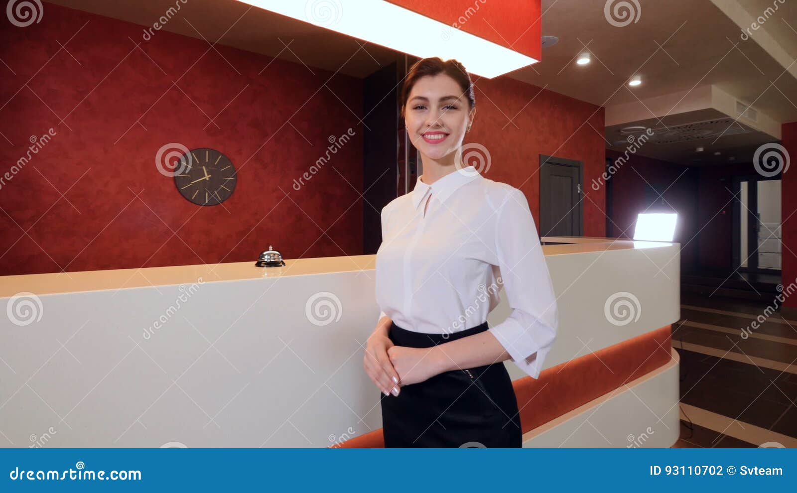 Smiling Receptionist at Hotel Reception Desk Meet Guests. 4K. Stock ...