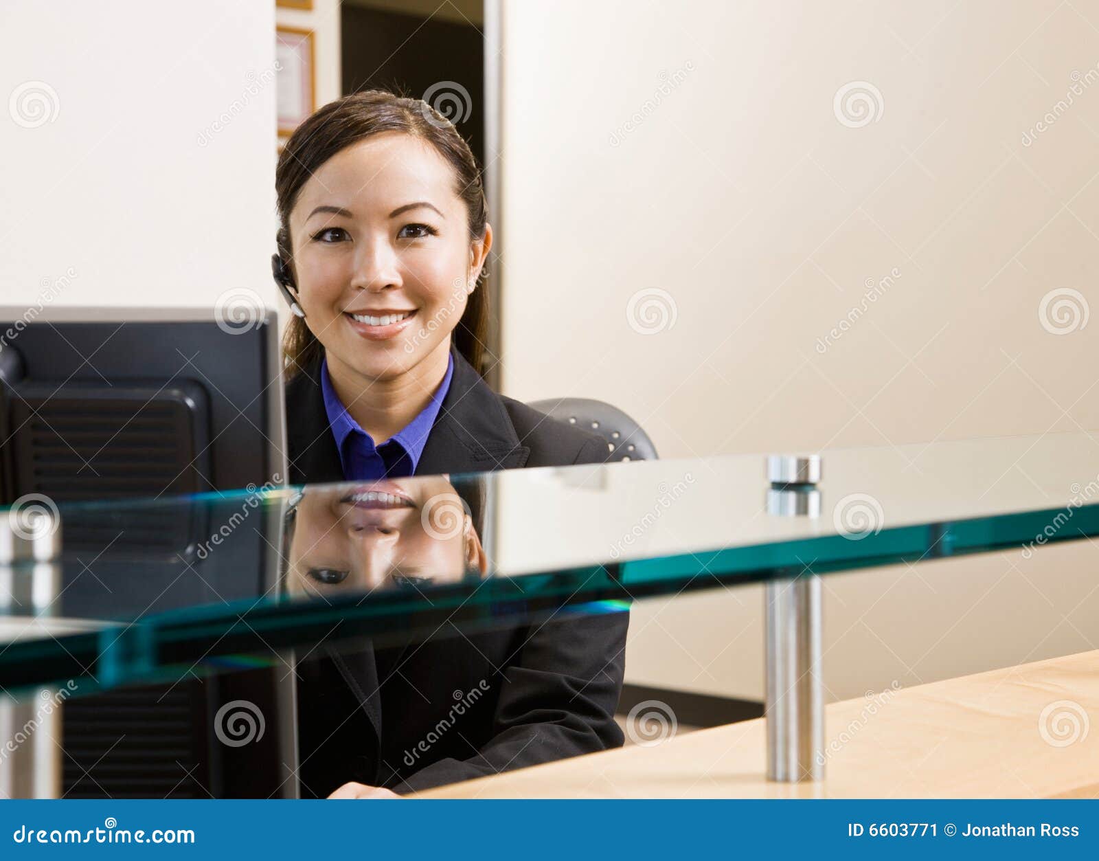 Smiling Receptionist with Telephone Earpiece Stock Image - Image of ...