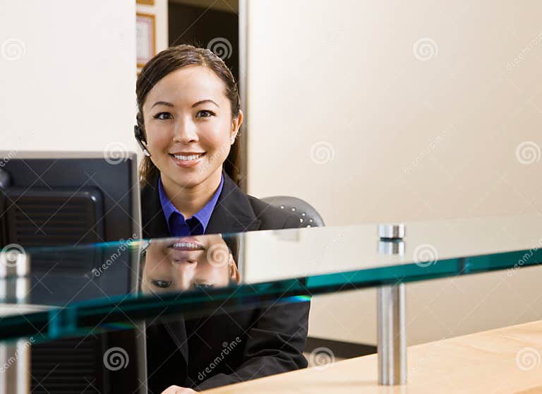 Smiling Receptionist with Telephone Earpiece Stock Image - Image of ...