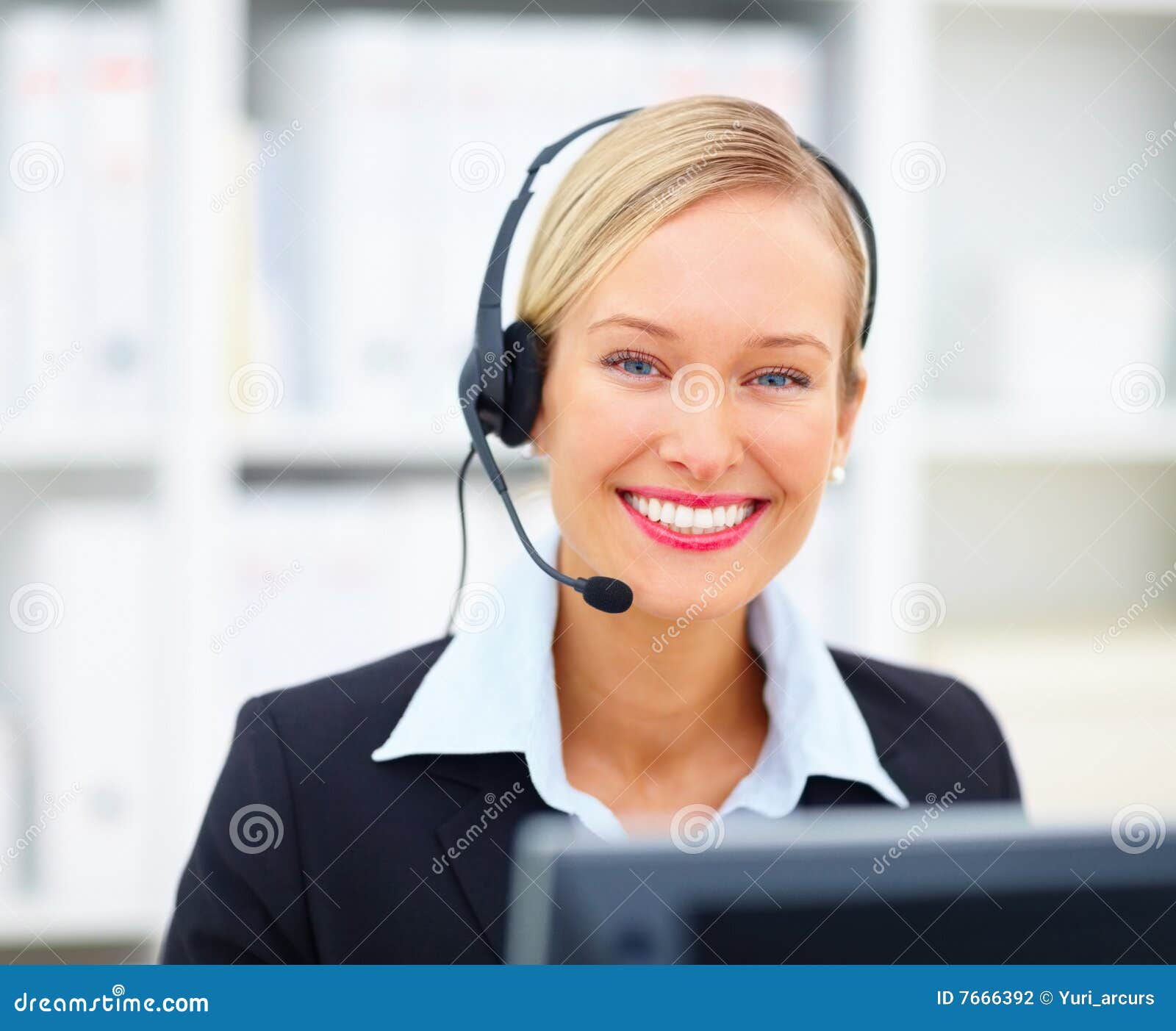 Smiling Receptionist in Work Place Using Headset Stock Photo - Image of ...