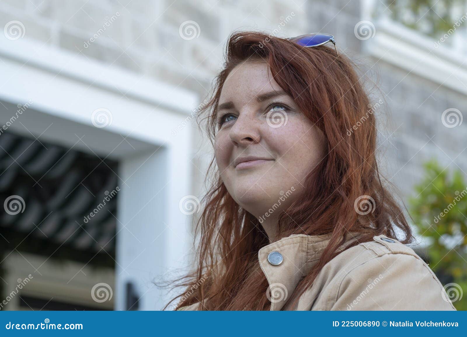 Smiling red-haired woman stock photo. Image of people - 225006890