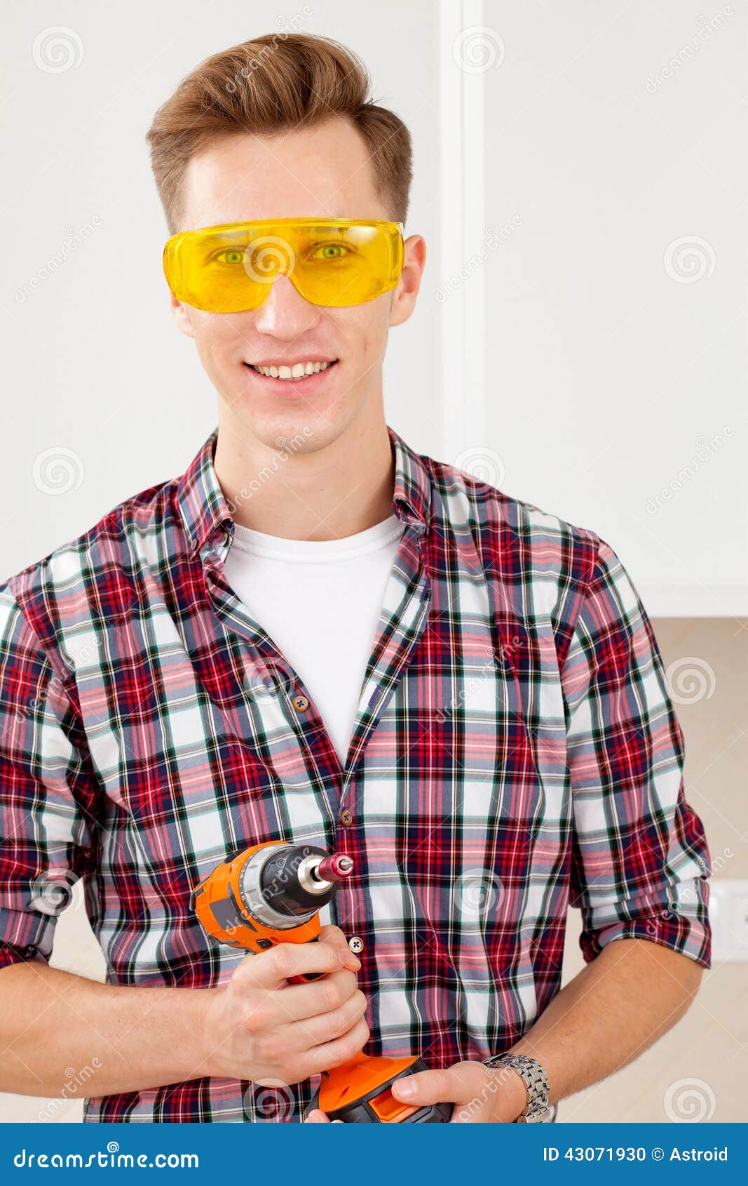 Smiling Repairman with a Dril Stock Photo - Image of builder ...