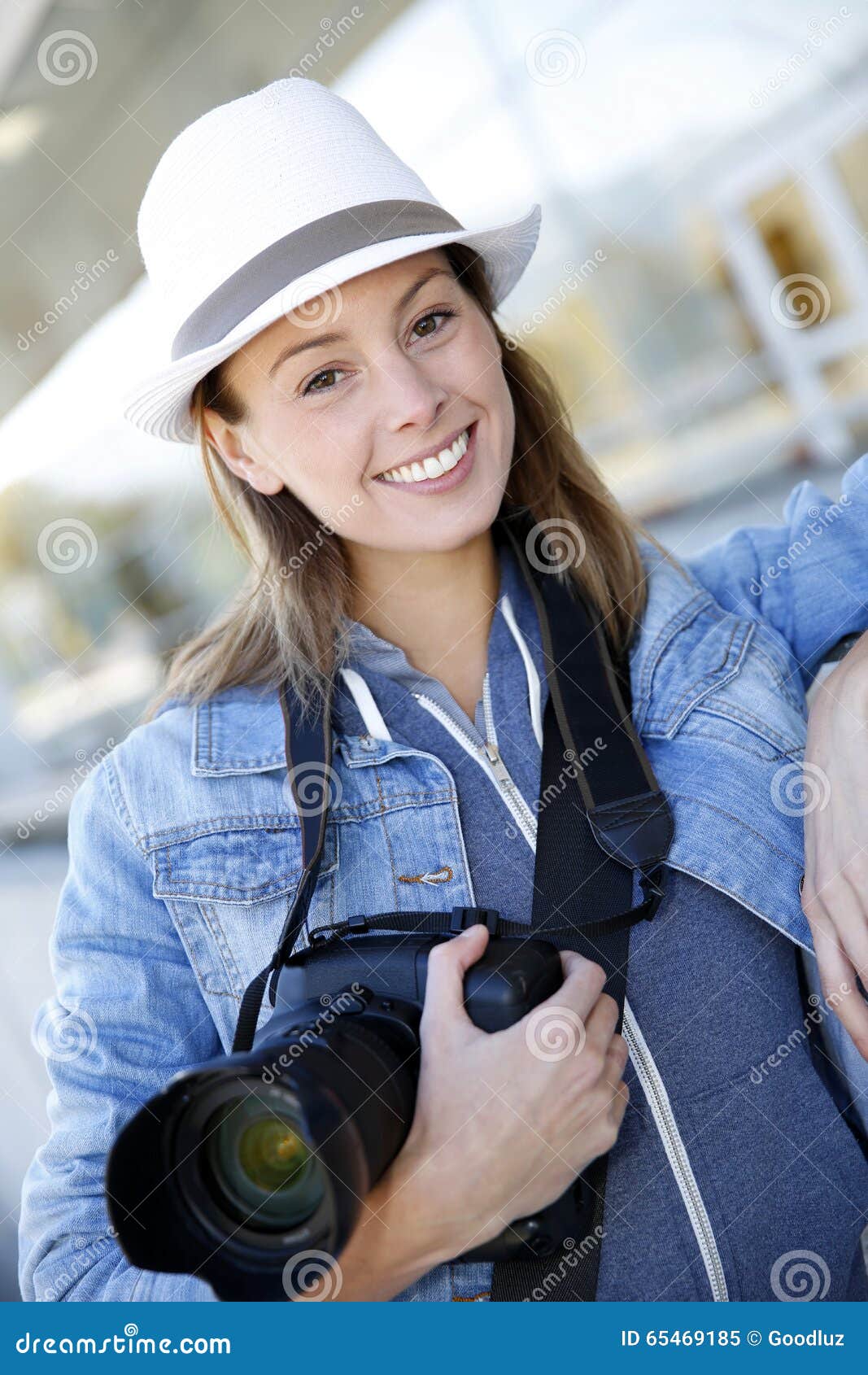 Smiling Reporter Holding a Reflex Camera Stock Image - Image of ...